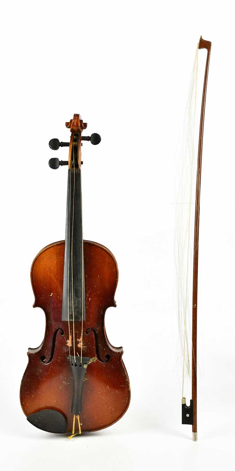 Lot 1038 - A three-quarter size violin with two-piece
