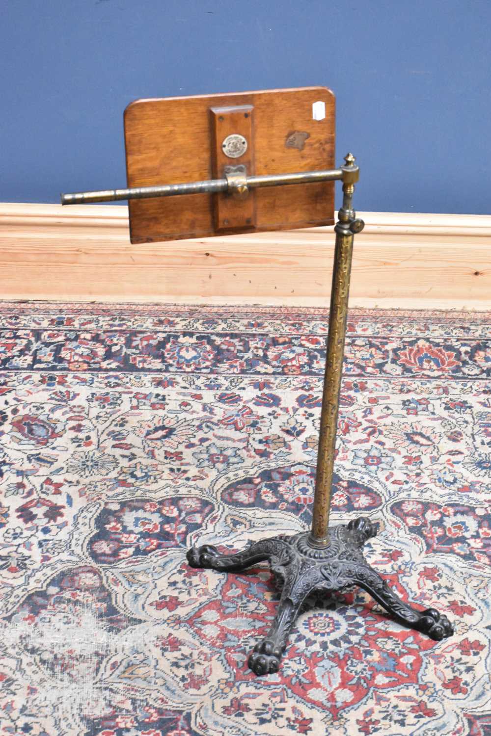 Lot 63 - A Victorian adjustable reading table with
