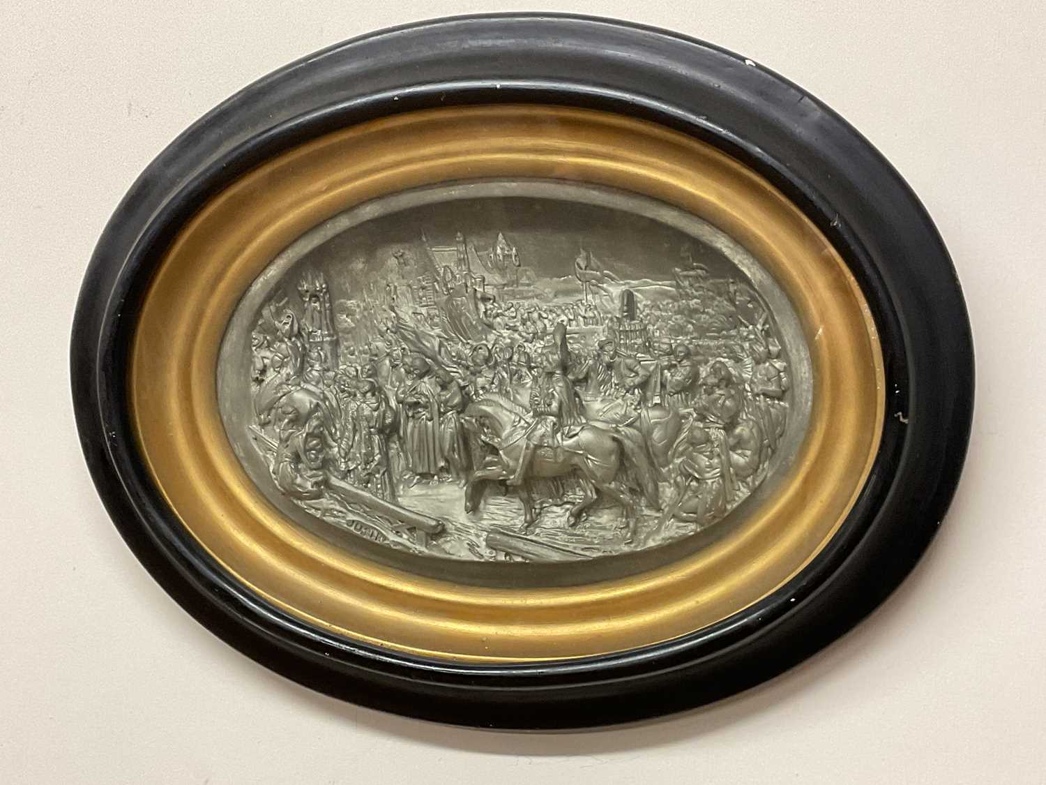 Lot 323 - A plaster relief plaque depicting Crusaders,