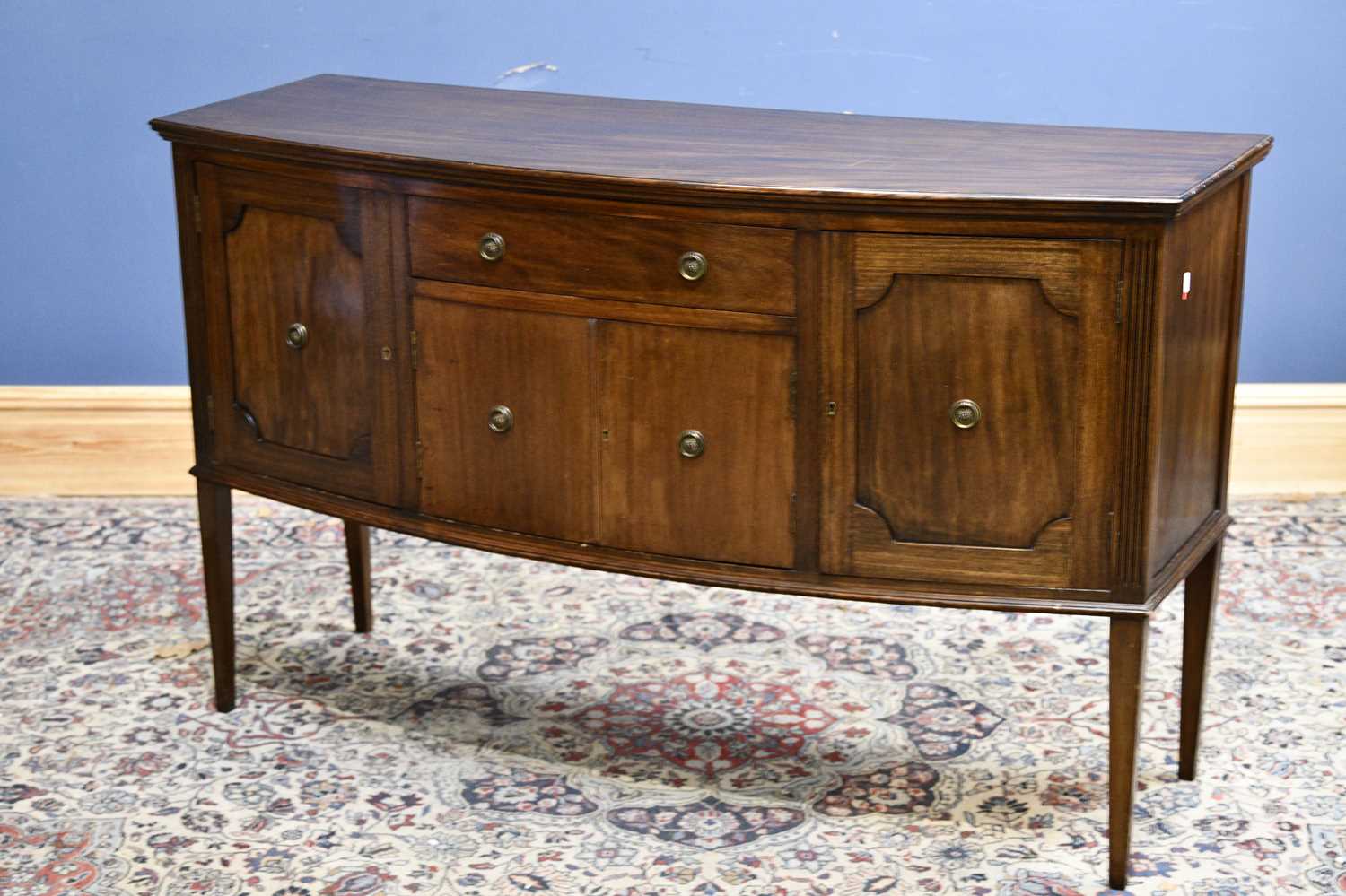 Lot 235 - A reproduction mahogany bowfronted sideboard,