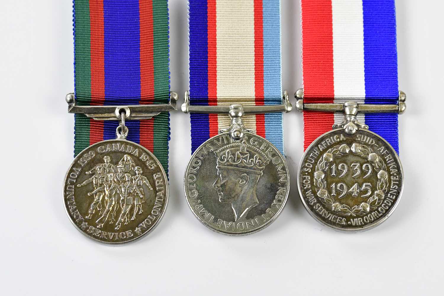 Lot 1572 - Three WWII Service Medals comprising an