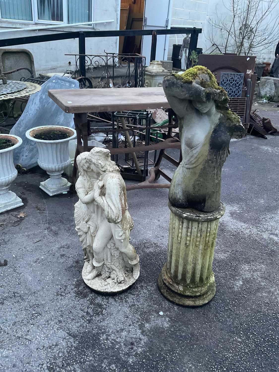 Lot 1237 - Two reconstituted stone figures, including