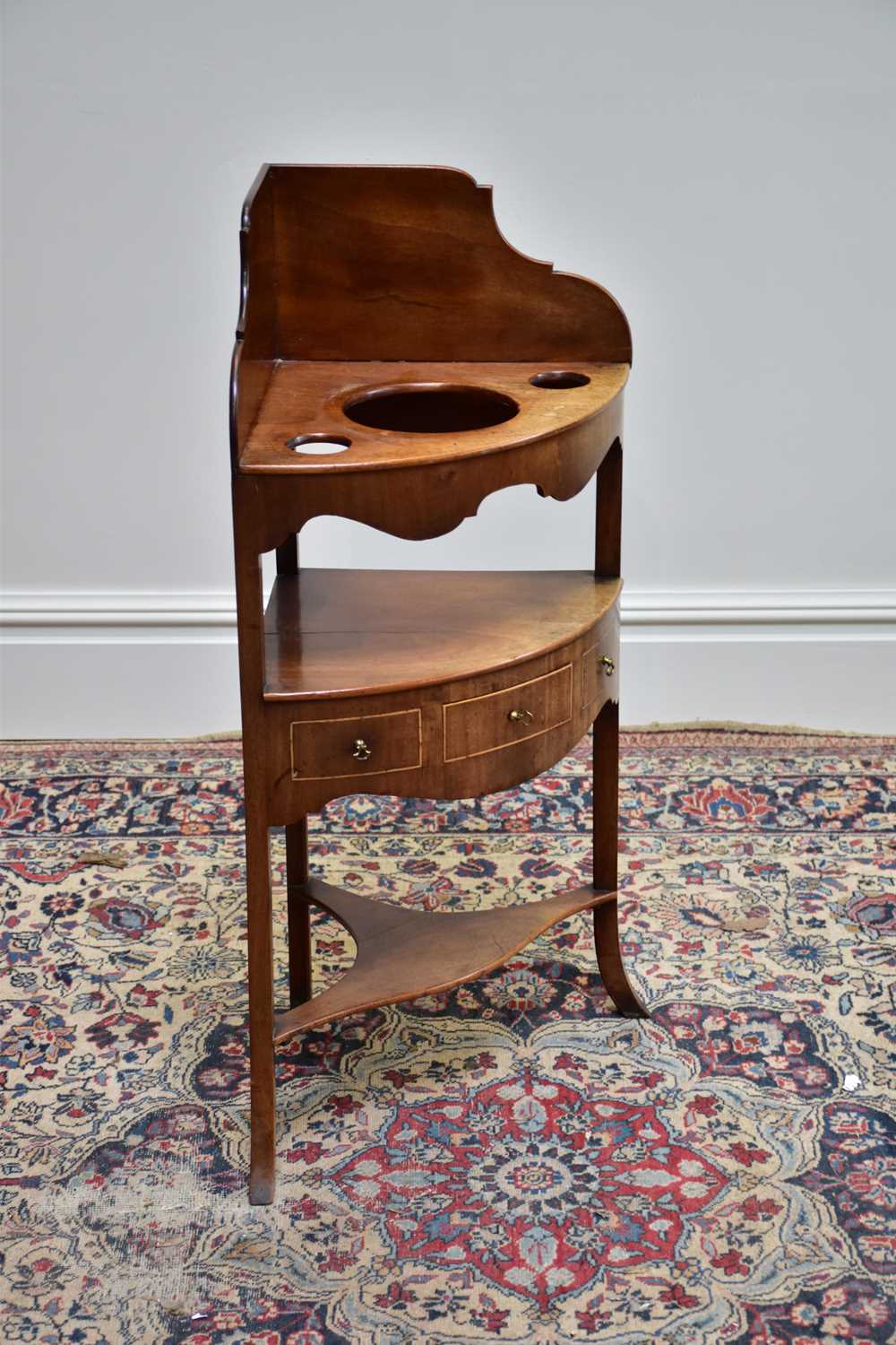 Lot 1085 - A 19th century mahogany corner washstand,