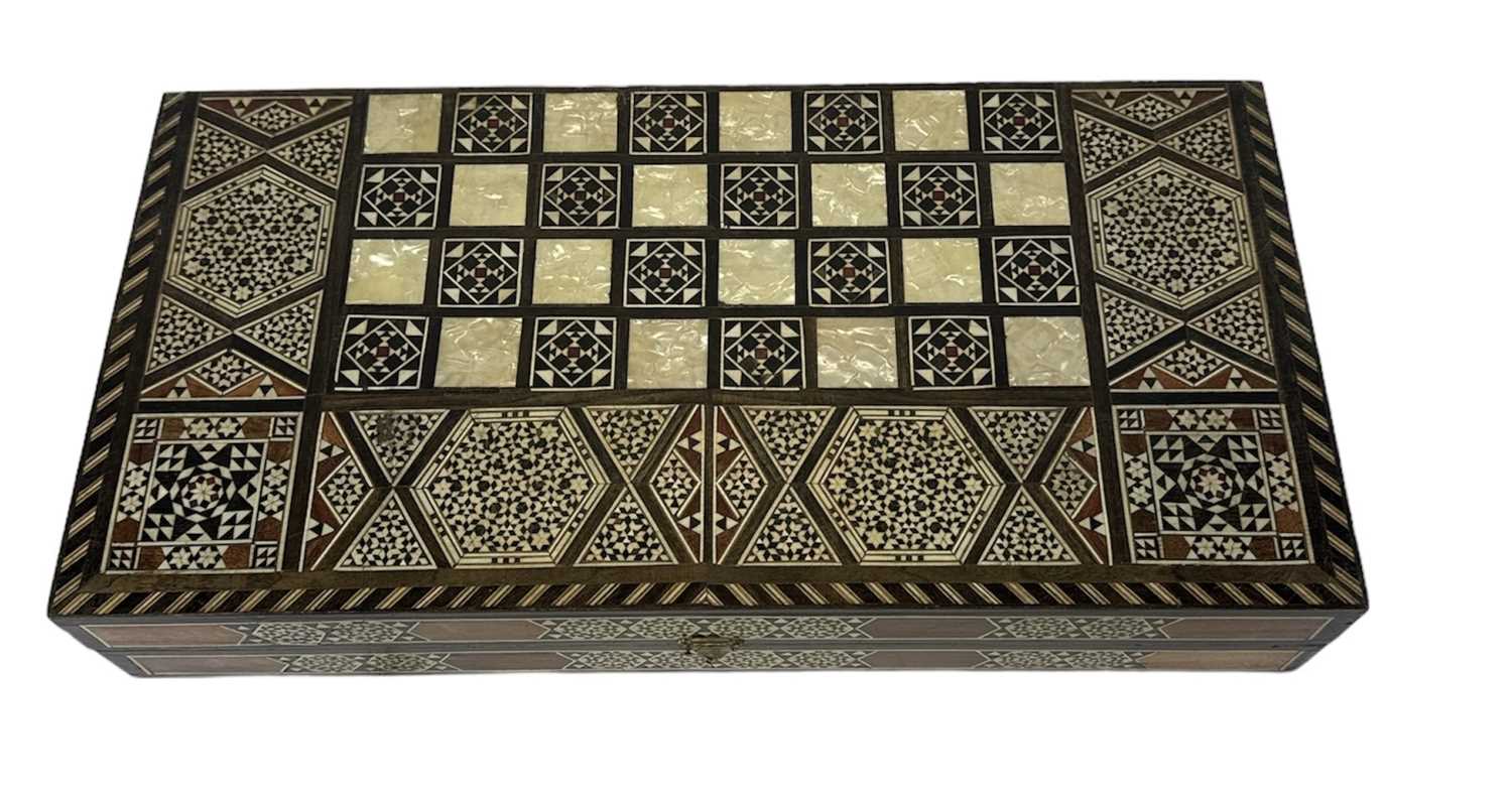 Lot 321 - A Middle Eastern mother of pearl inlaid