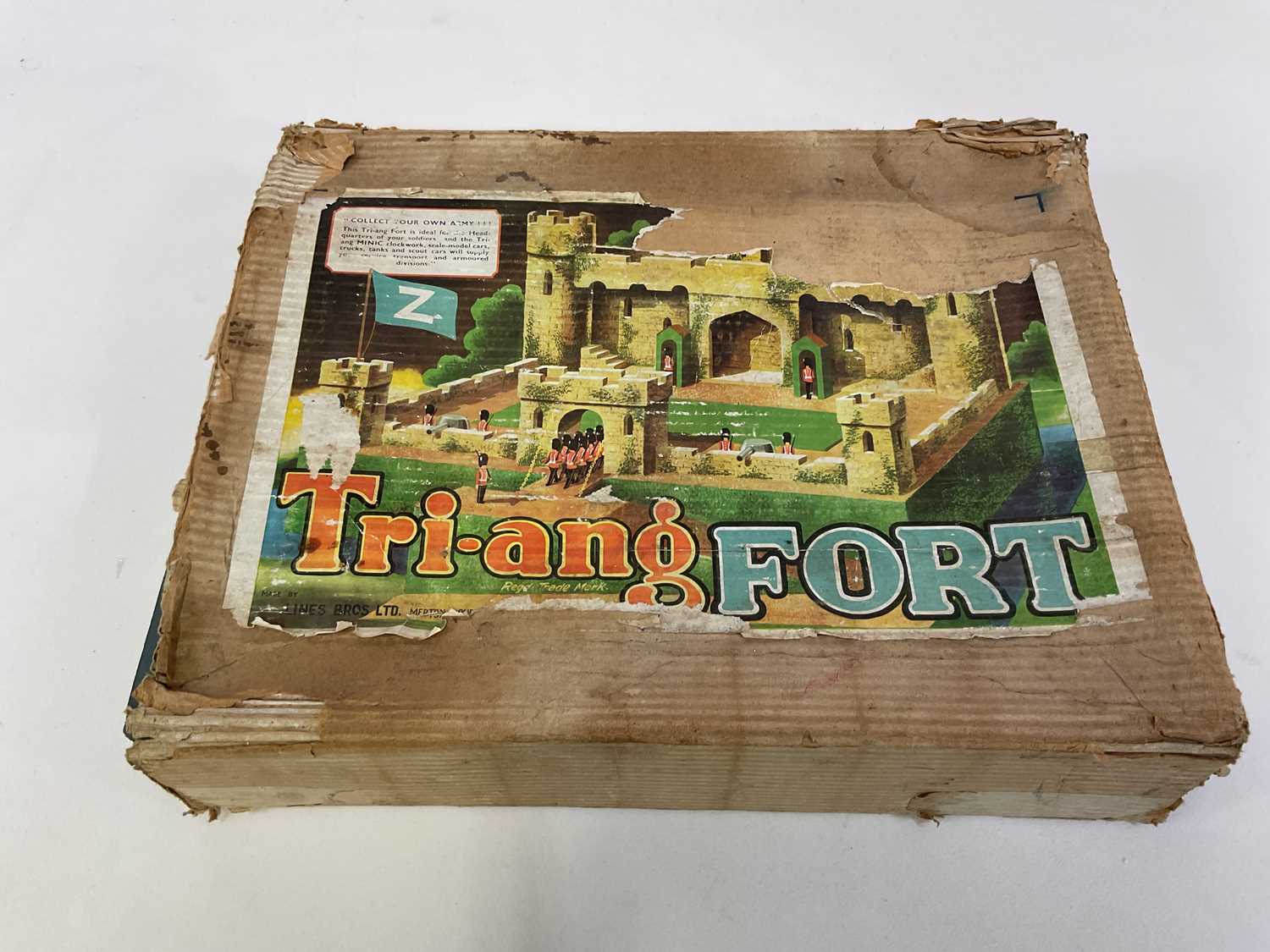 Lot 410 - TRI-ANG; a boxed wooden Fort Z, a ramp