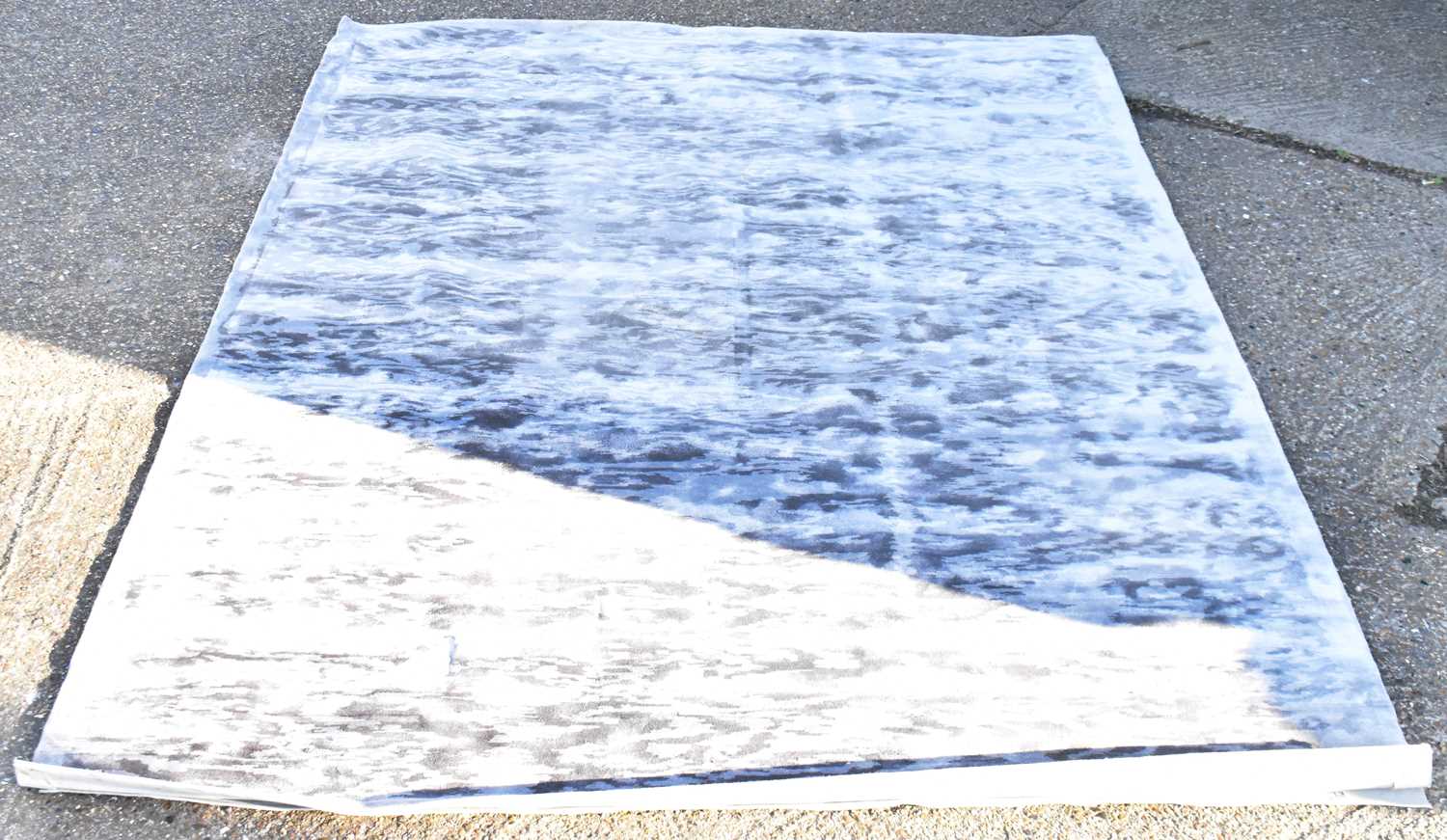 Lot 137 - A large modern dark grey ground carpet, 370