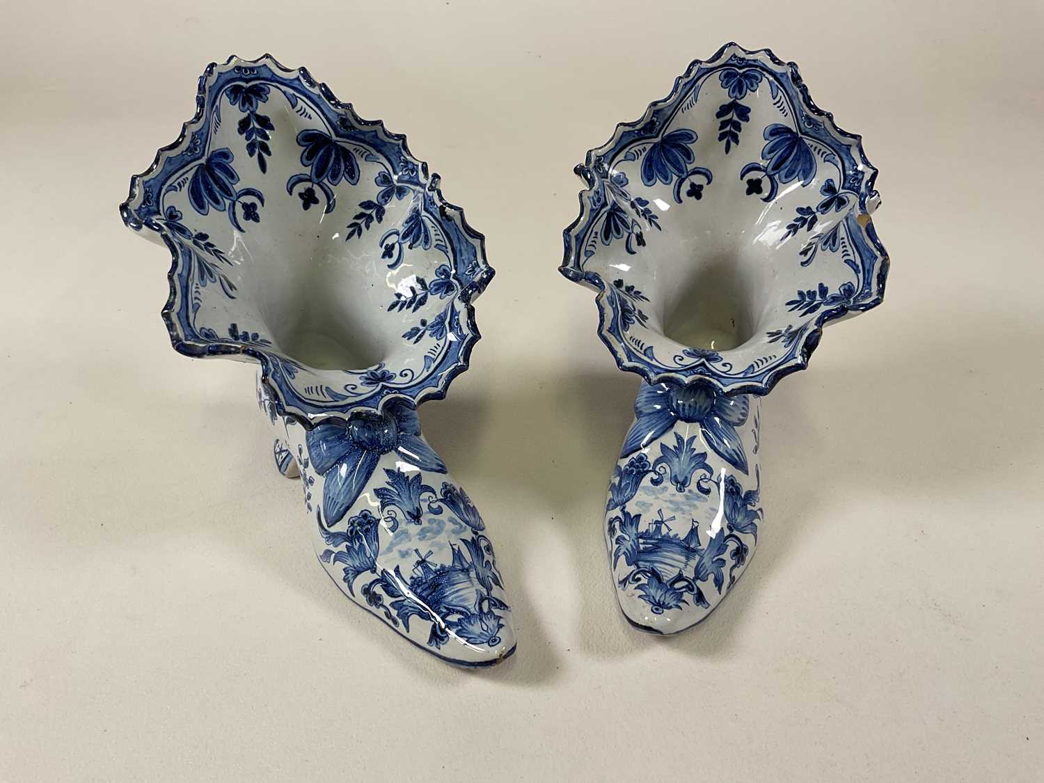 Lot 465 - A pair of Dutch Delft shoes with elborate