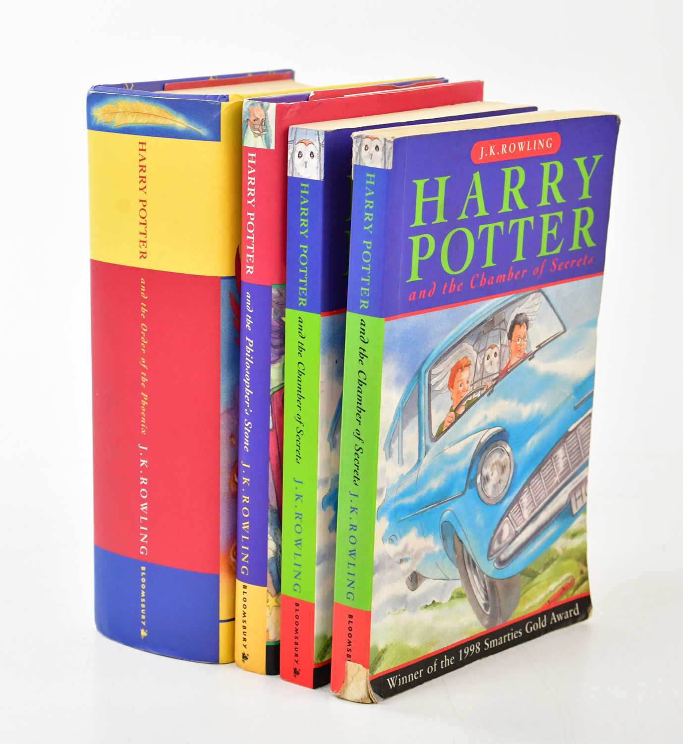 Lot 2663 - J K ROWLING; a group of four Harry Potter