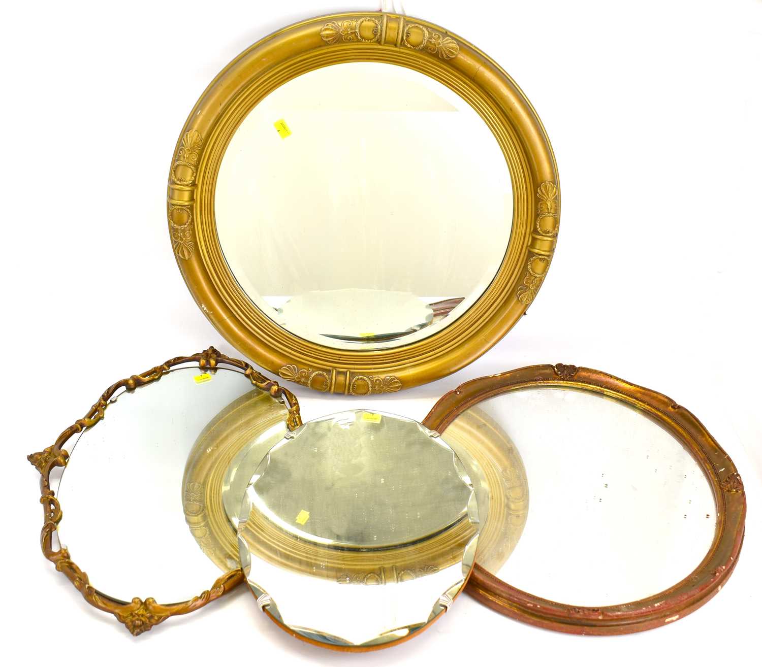 Lot 105 - Four wall mirrors, comprising an oval