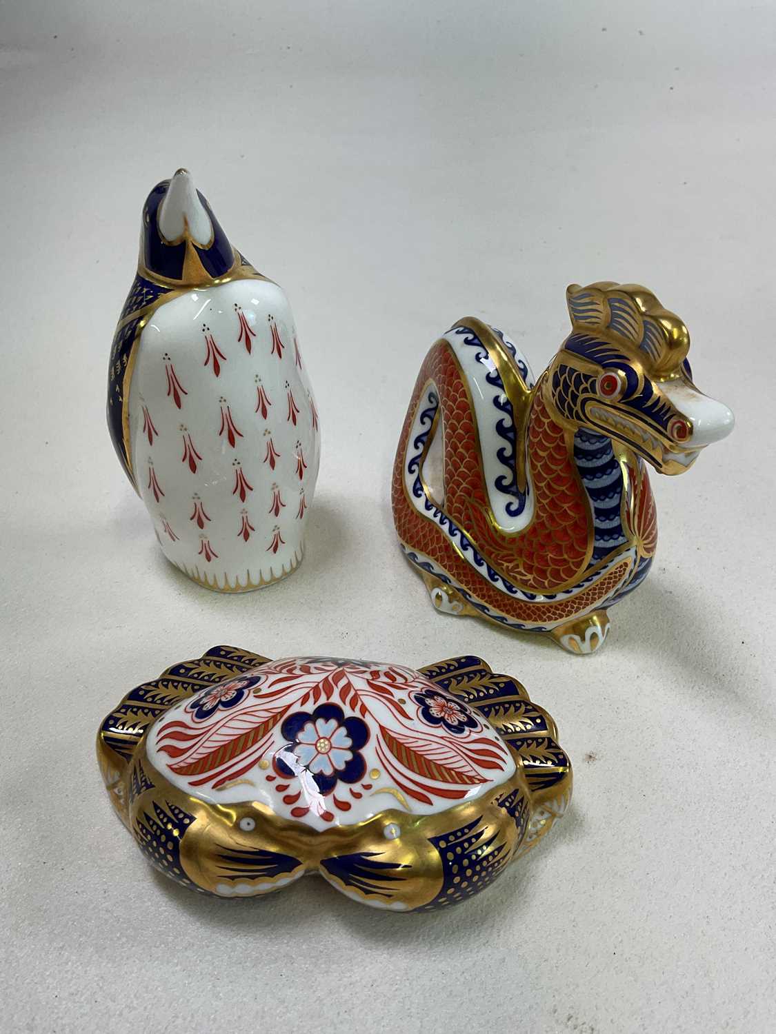 Lot 293 - ROYAL CROWN DERBY; three paperweights to