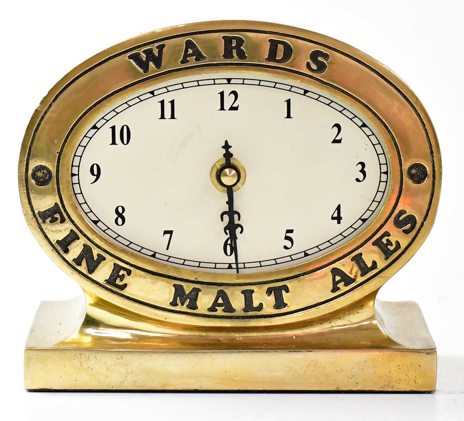 Lot 140 - A reproduction brass advertising clock for