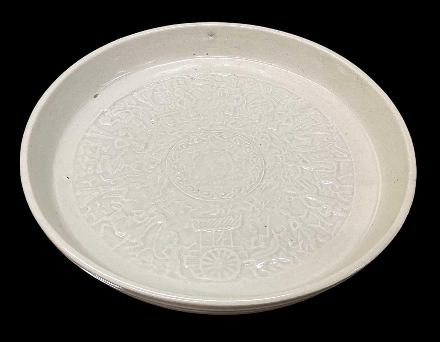 Lot 1075 - A Chinese celadon glazed dish, the interior