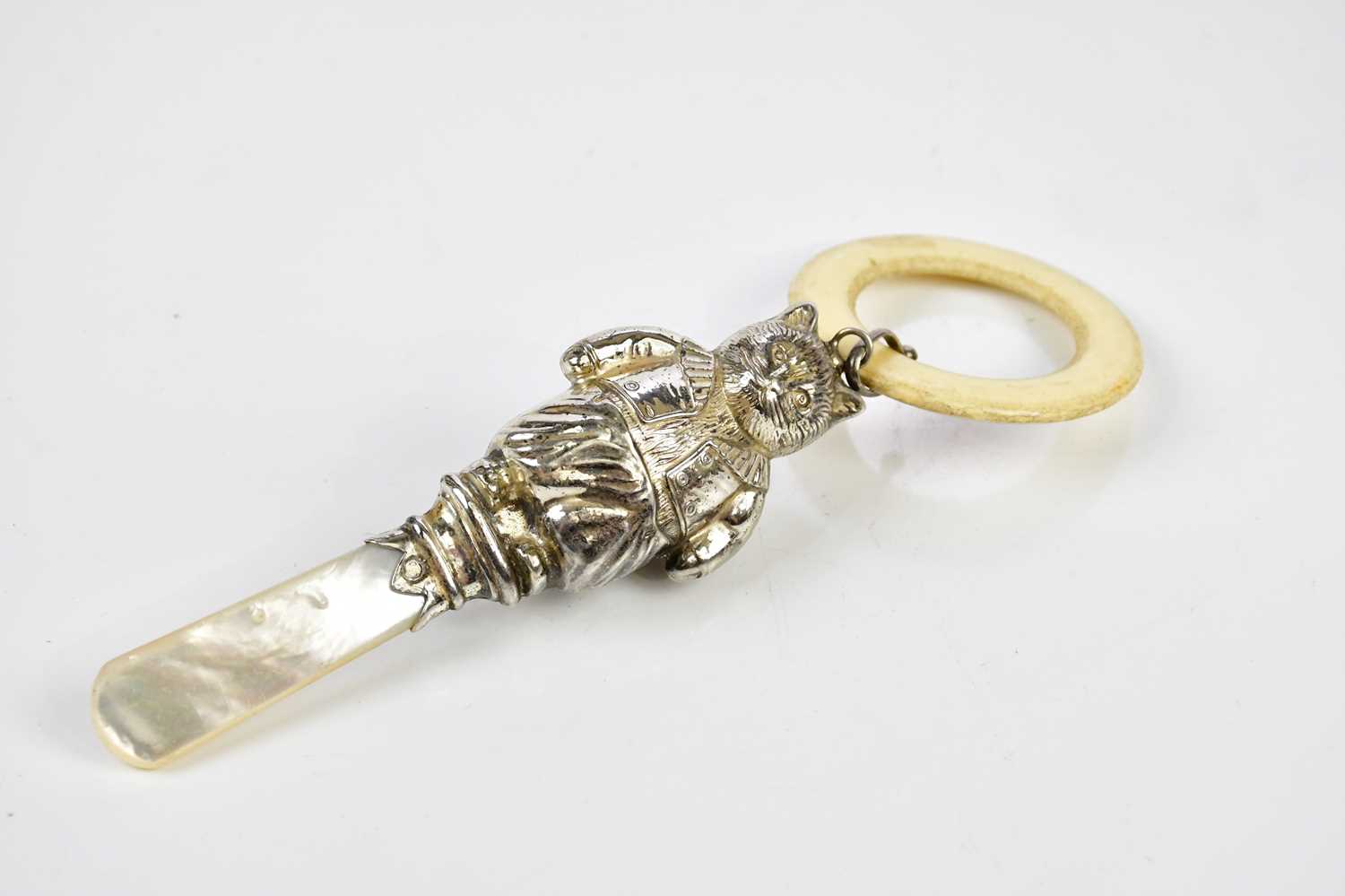 Lot 2128 - A hallmarked silver cat rattle, Chester