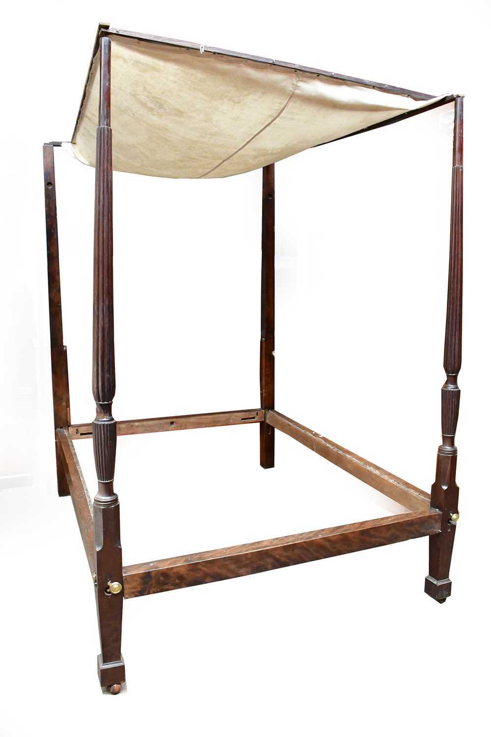 Lot 1011 - A mahogany and oak four poster bed, with
