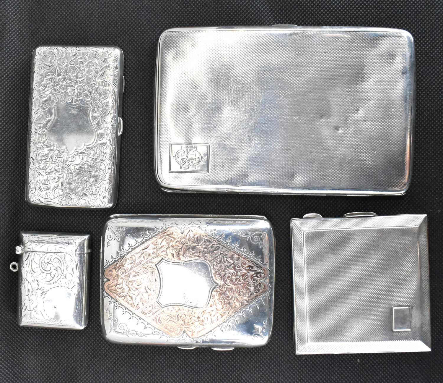 Lot 608 - Three hallmarked silver cigarette cases,