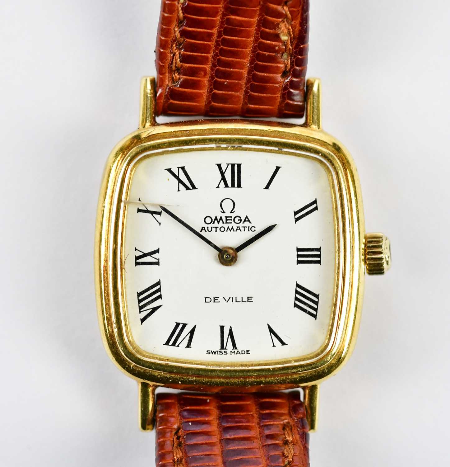 Lot 2292 - OMEGA; an 18ct yellow gold lady's DeVille