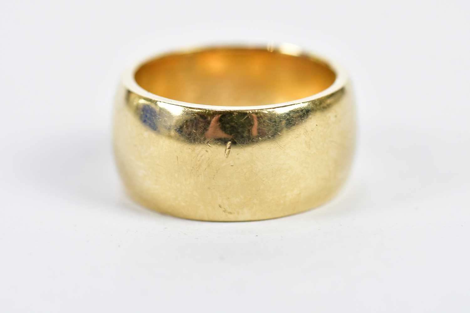 Lot 145 - A yellow metal inscribed with initials and