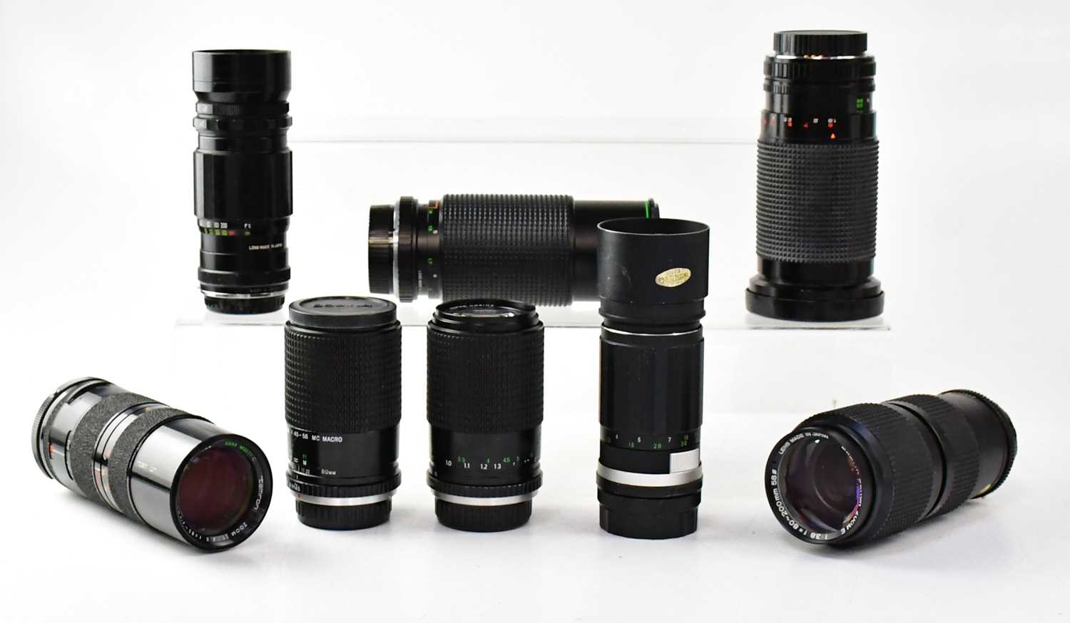 Lot 543 - Eight various camera lenses to include a