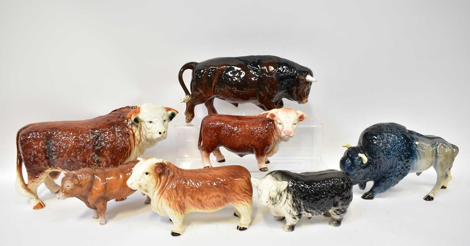 Lot 375 - Seven ceramic bulls, including a Beswick