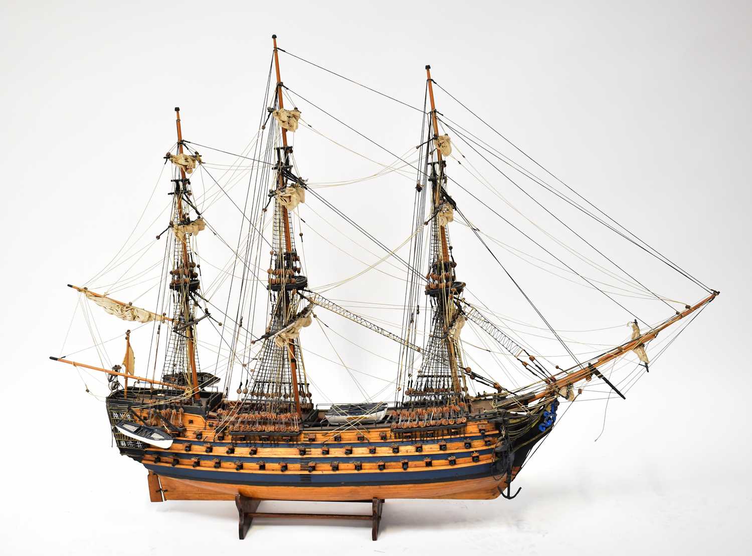 Lot 702 - A scale model of HMS Victory, on stand, with