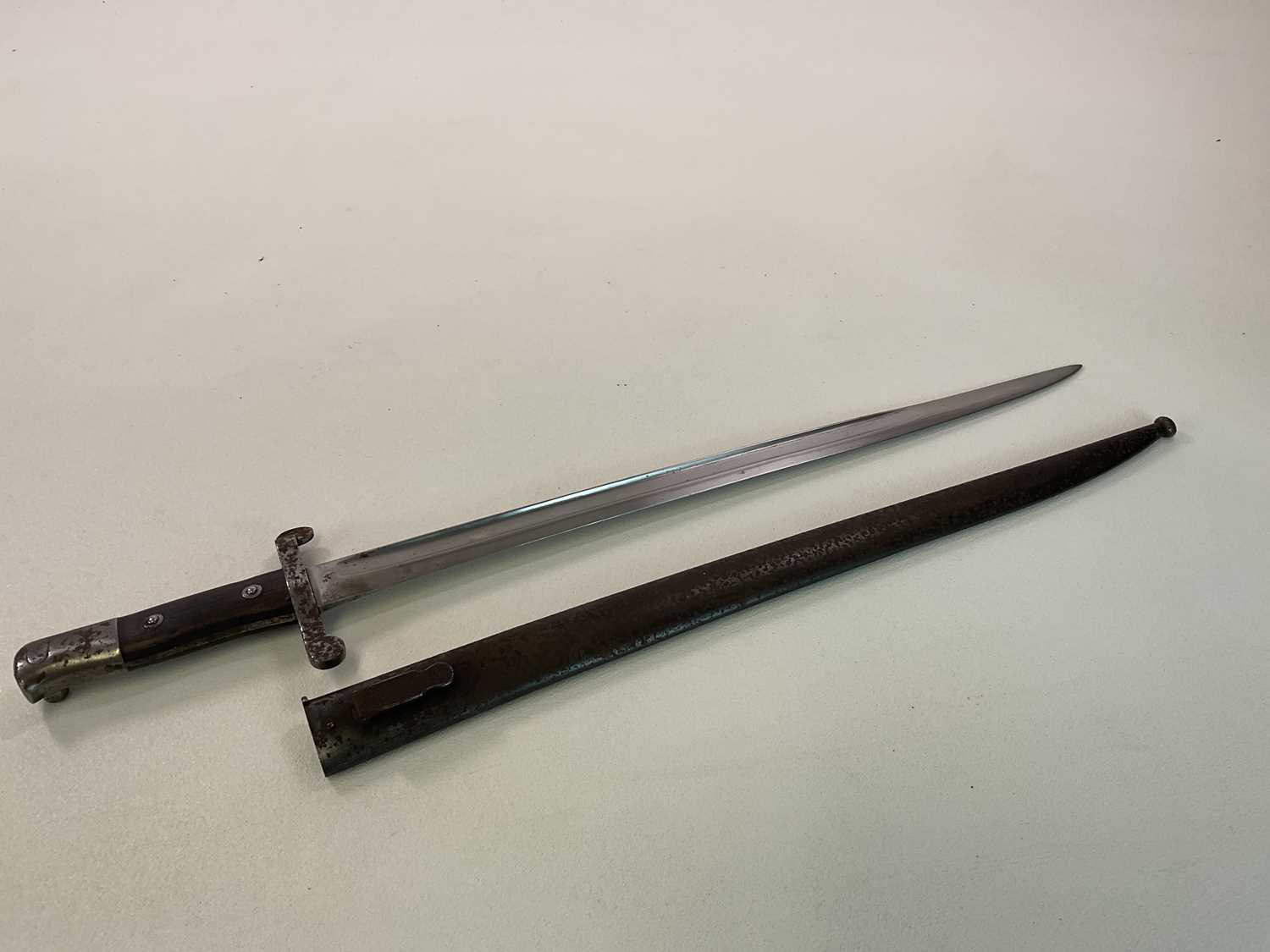 Lot 18 - A British Victorian bayonet with scabbard,
