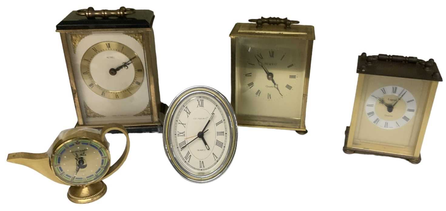 Lot 142 - A group of five modern timepieces including