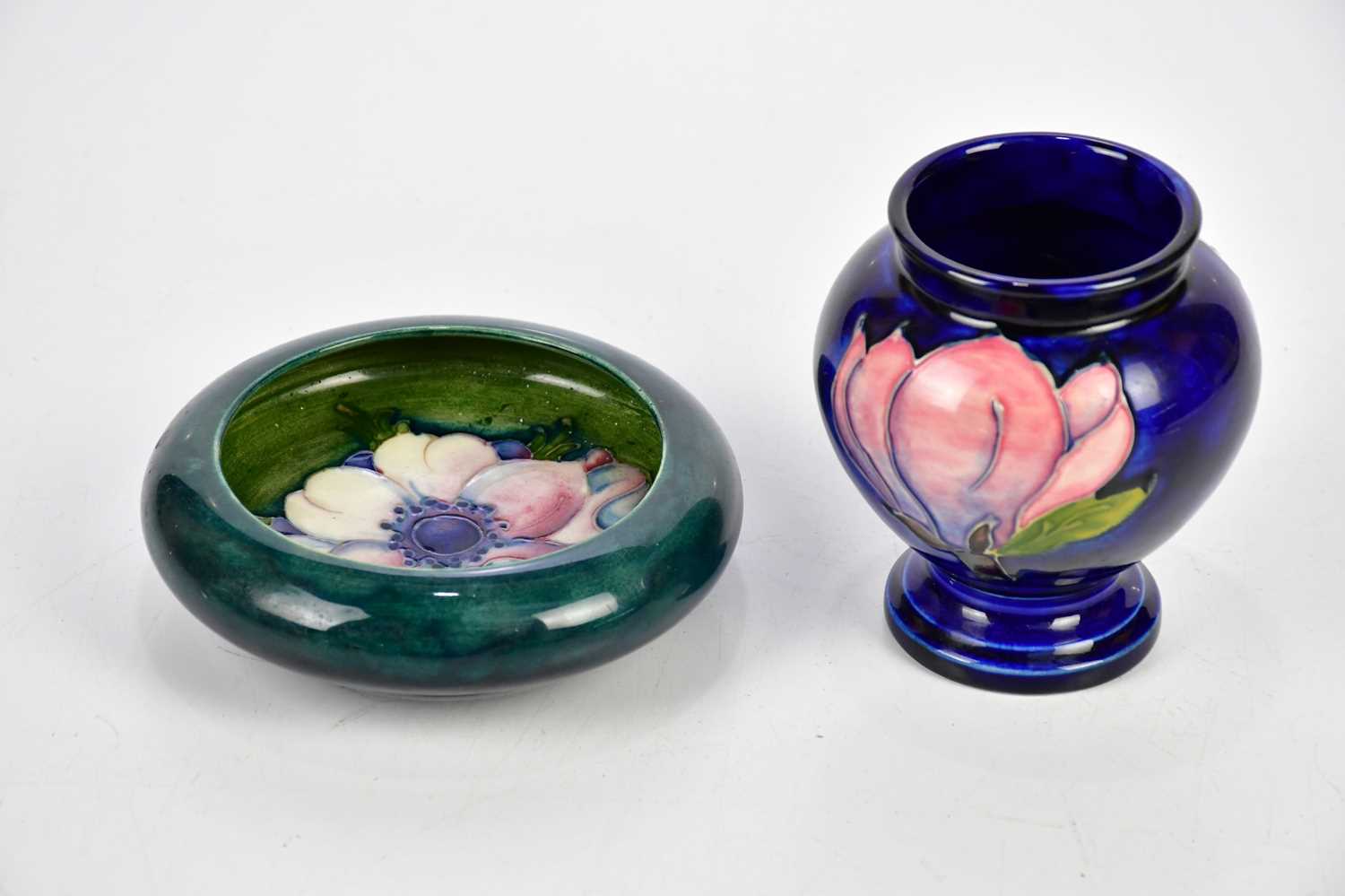 Lot 1376 - WALTER MOORCROFT; a circular pin dish in