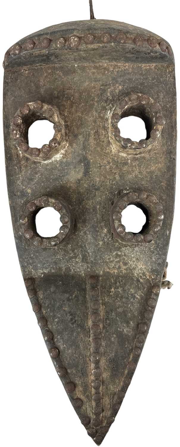 Lot 1076 - A Dan Gagon headdress/mask with four eyes
