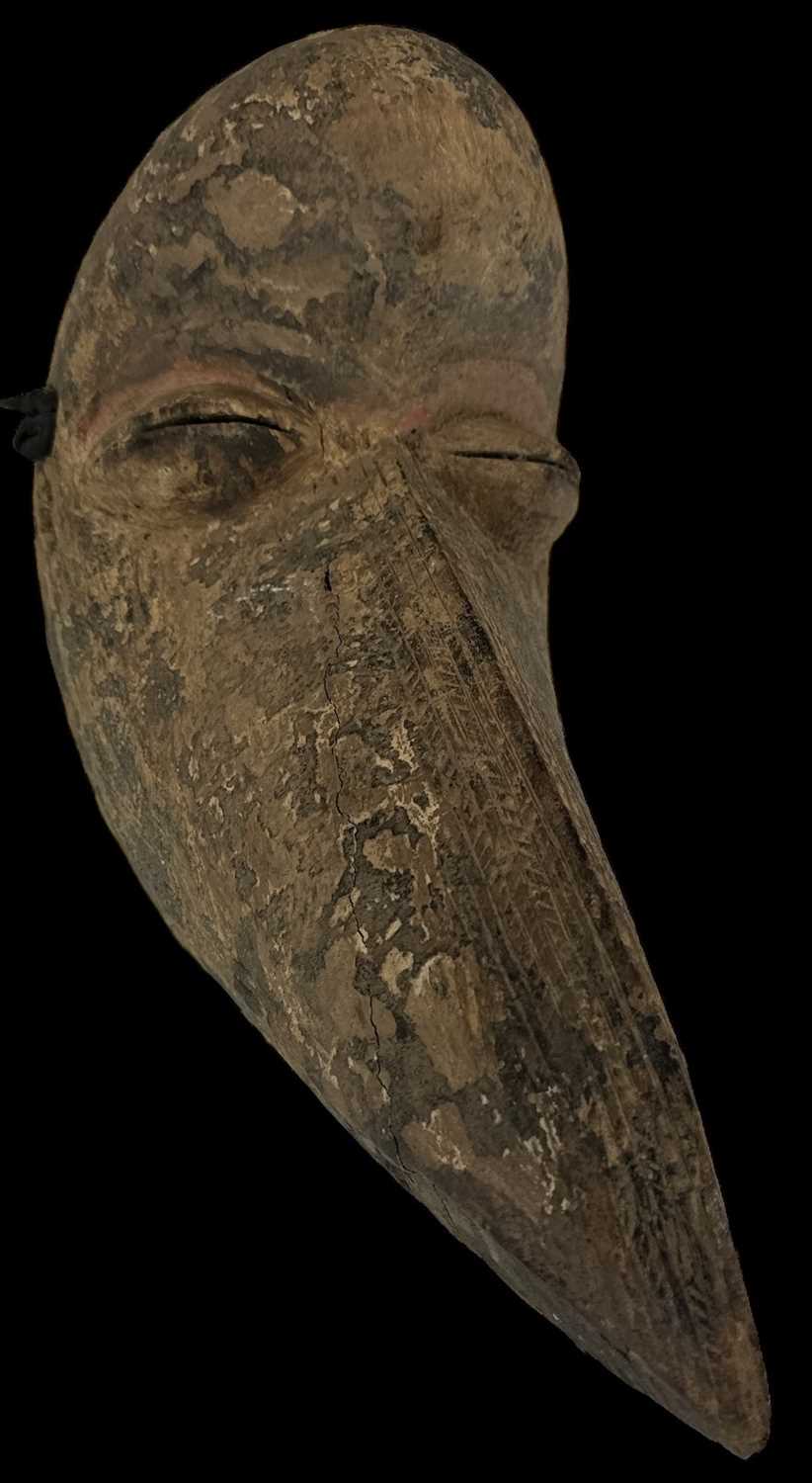 Lot 1226 - A Dan Gagon beak mask, height 30cm, width