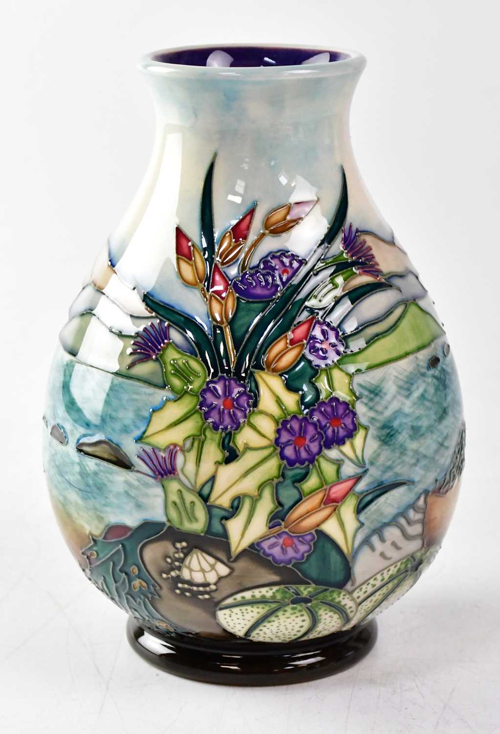 Lot 148 - MOORCROFT; a vase in the 'Islay' design,