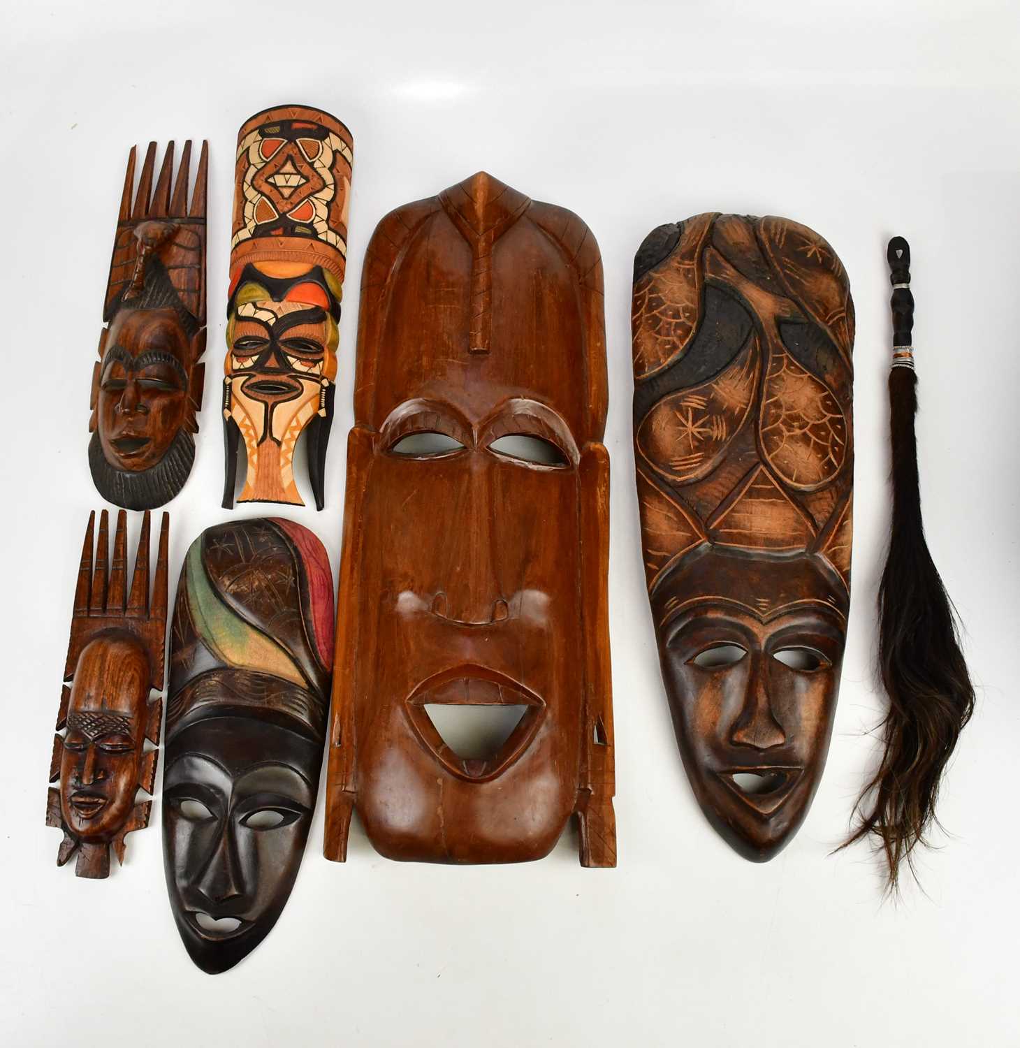 Lot 1332 - A collection of six decorative African
