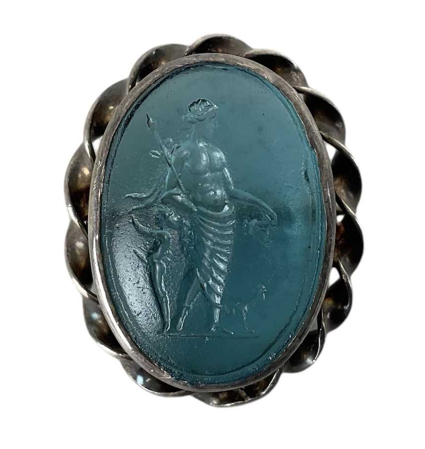 Lot 1559 - A 19th century white metal intaglio brooch,