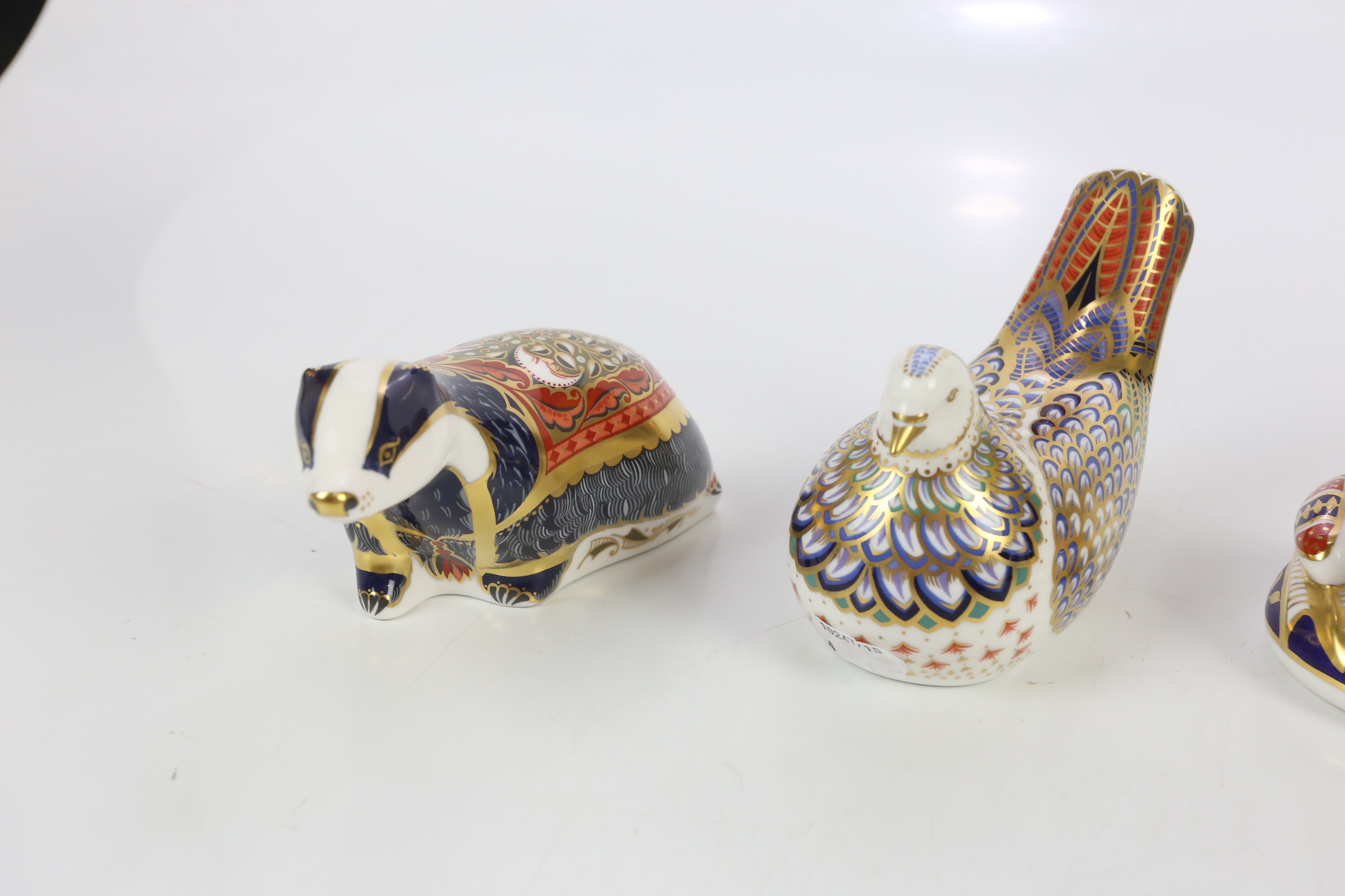 Lot 1365 - ROYAL CROWN DERBY; four animal paperweights,