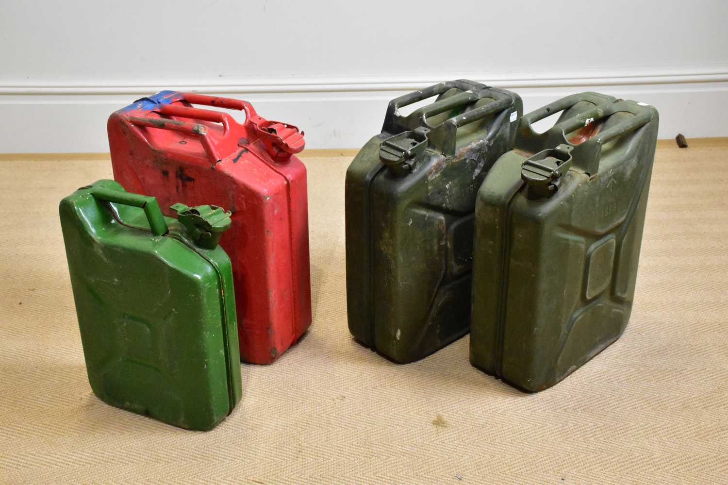 Lot 609 - Four vintage metal jerry cans including a