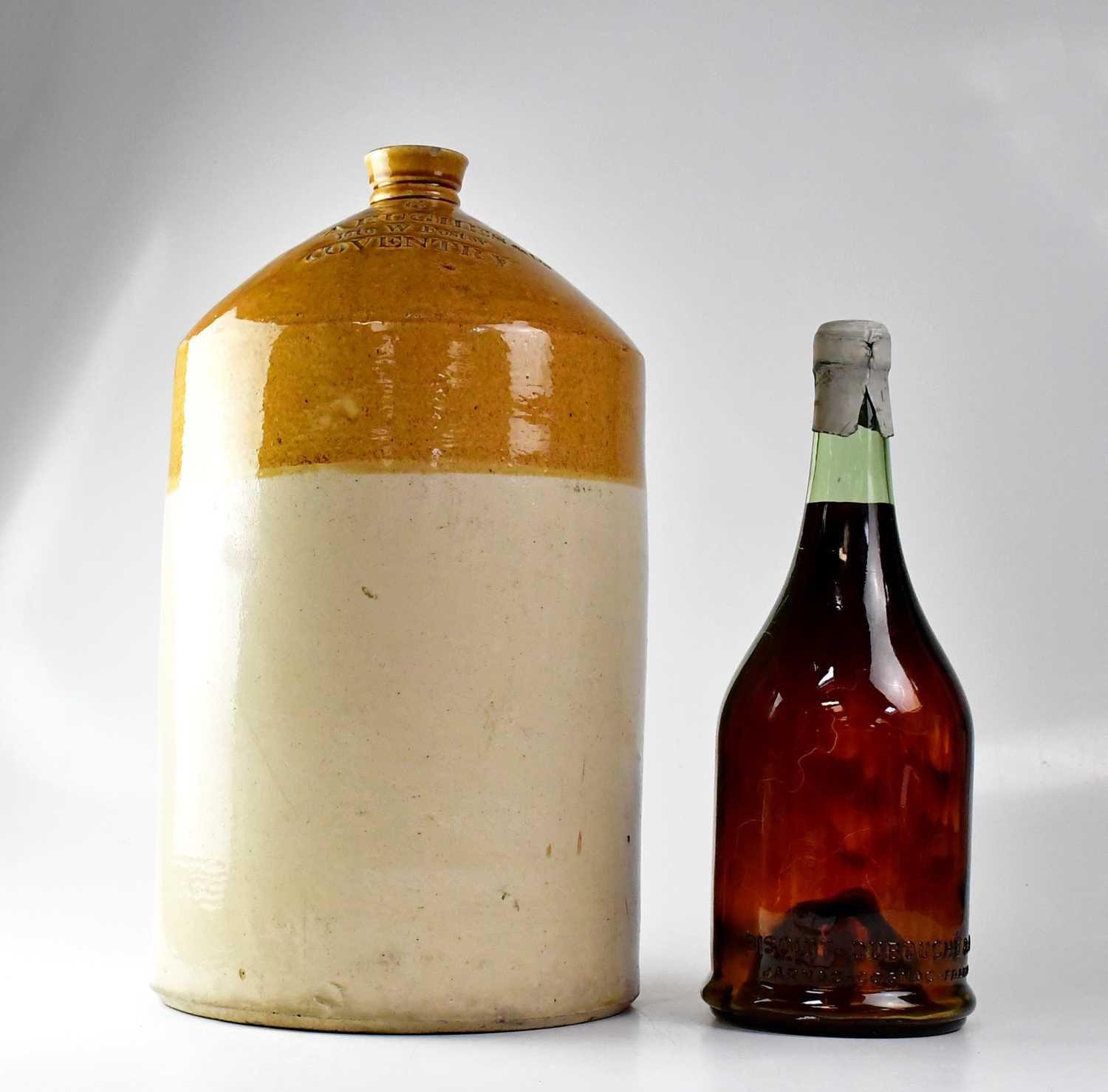 Lot 328 - A large salt glazed flagon, impressed to the