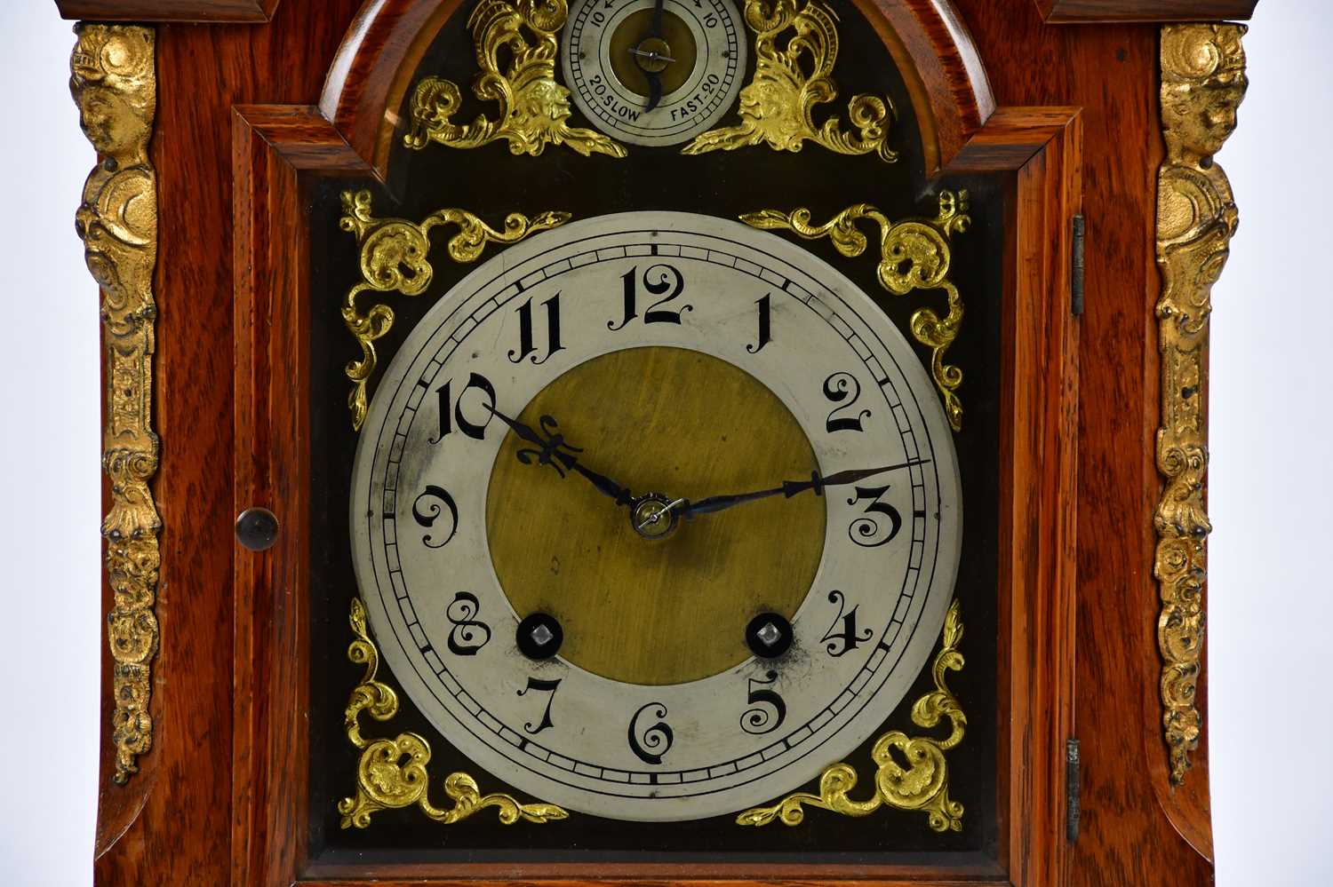 Lot 371 - An early 20th century oak mantel clock with