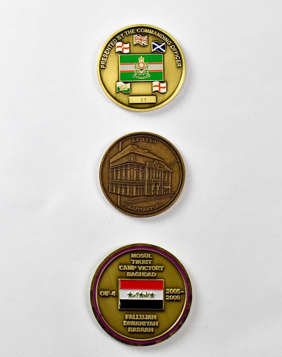 Lot 581 - Three military themed commemorative tokens,