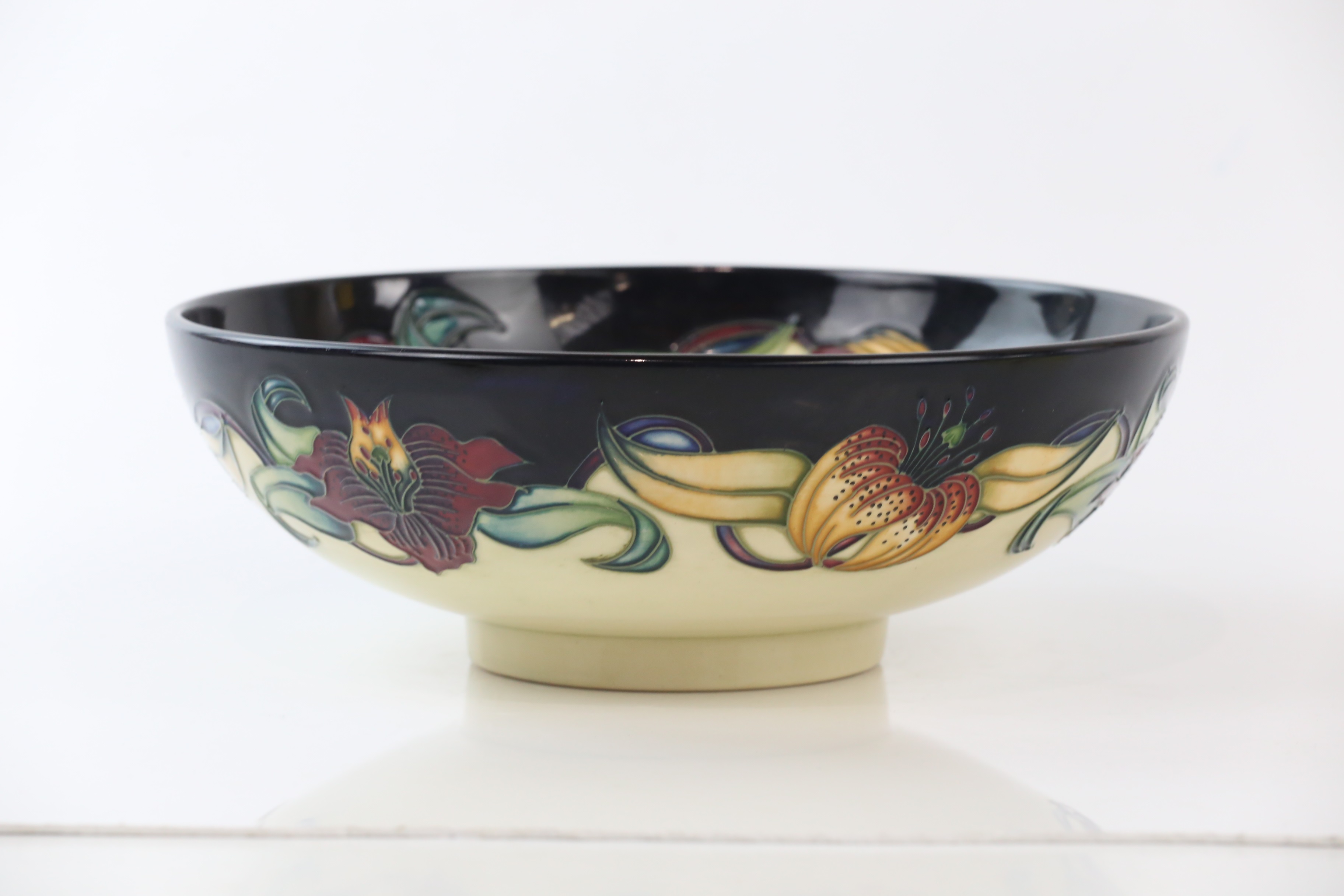Lot 2343 - EMMA BOSSONS FOR MOORCROFT; a large footed