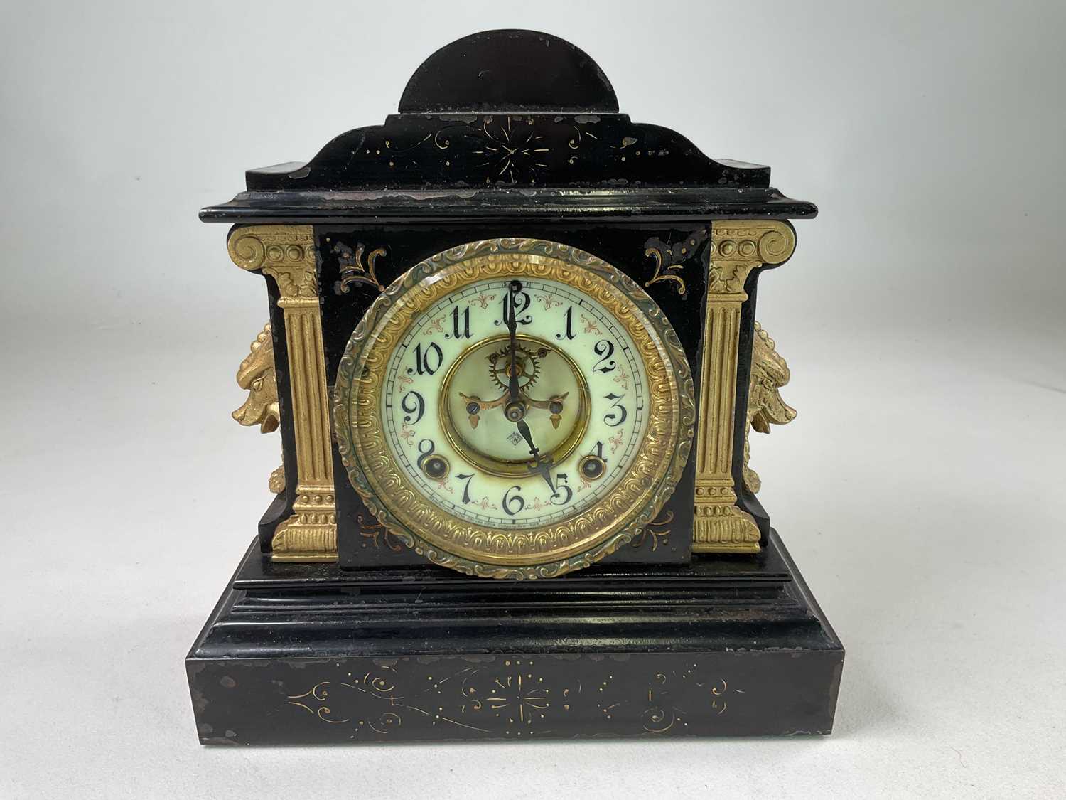 Lot 524 - ANSONIA CLOCK CO; a mantel clock in black