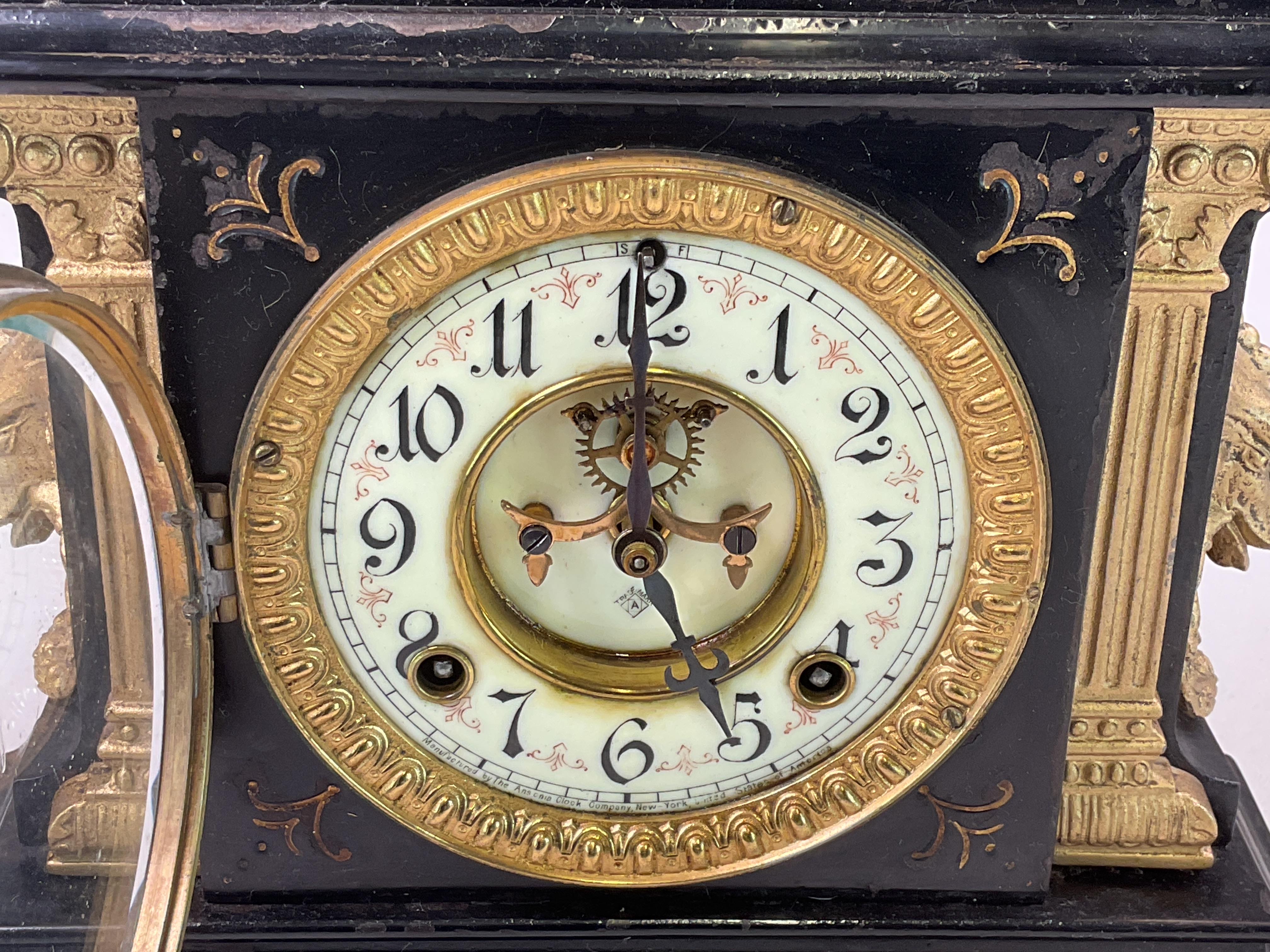Lot 524 - ANSONIA CLOCK CO; a mantel clock in black
