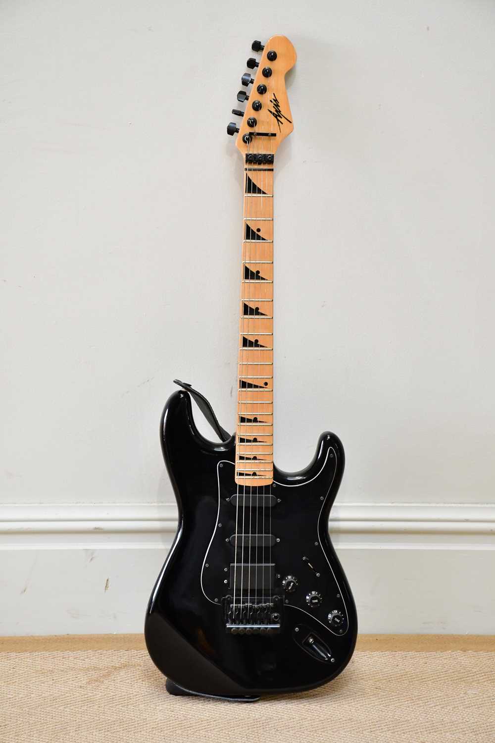 Lot 1095 - AXIS; a six string electric guitar together