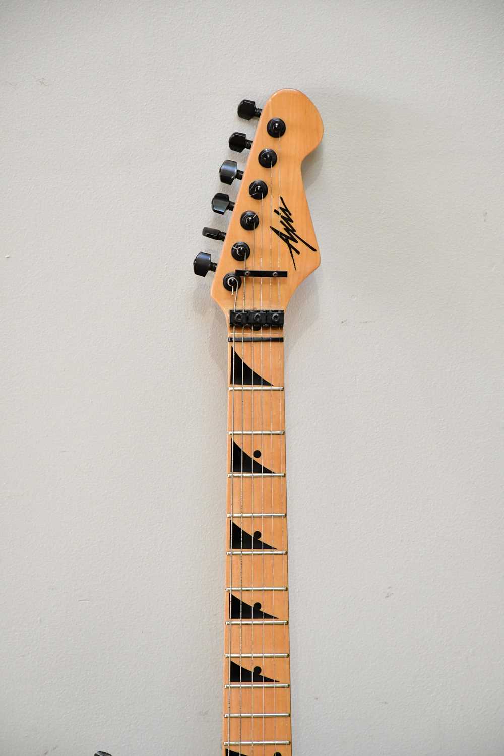 Lot 1095 - AXIS; a six string electric guitar together