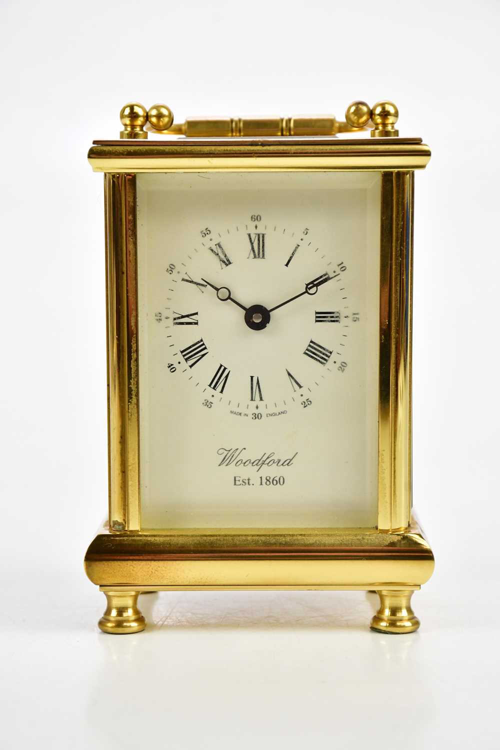 Lot 1430 - WOODFORD; a brass cased carriage clock, the