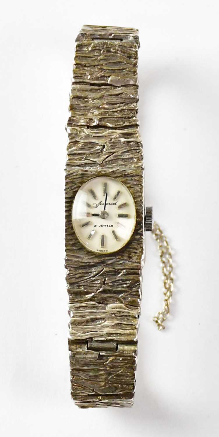 Lot 1184 - ACCURIST; a 925 silver bark-effect cocktail