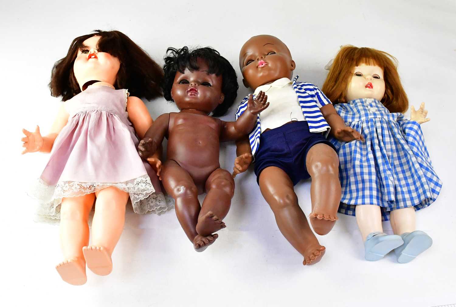 Lot 729 - A collection of mid-century jointed dolls,