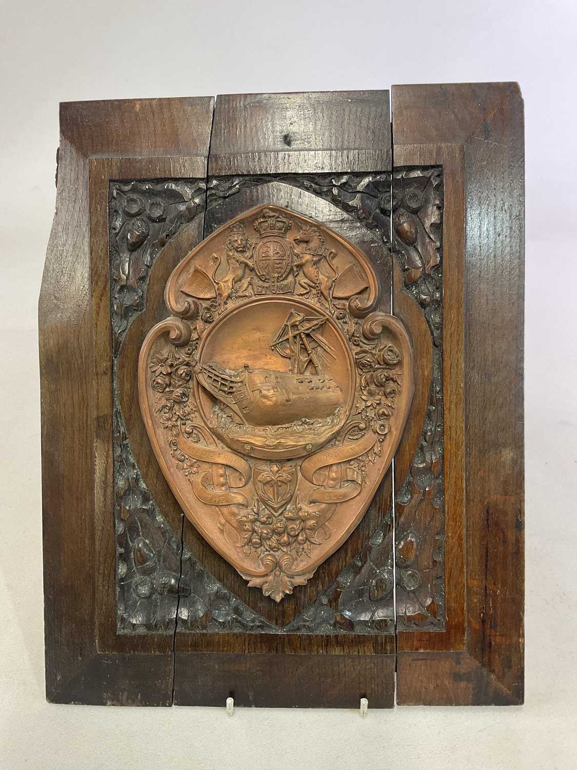 Lot 36 - A copper and oak plaque from the Old