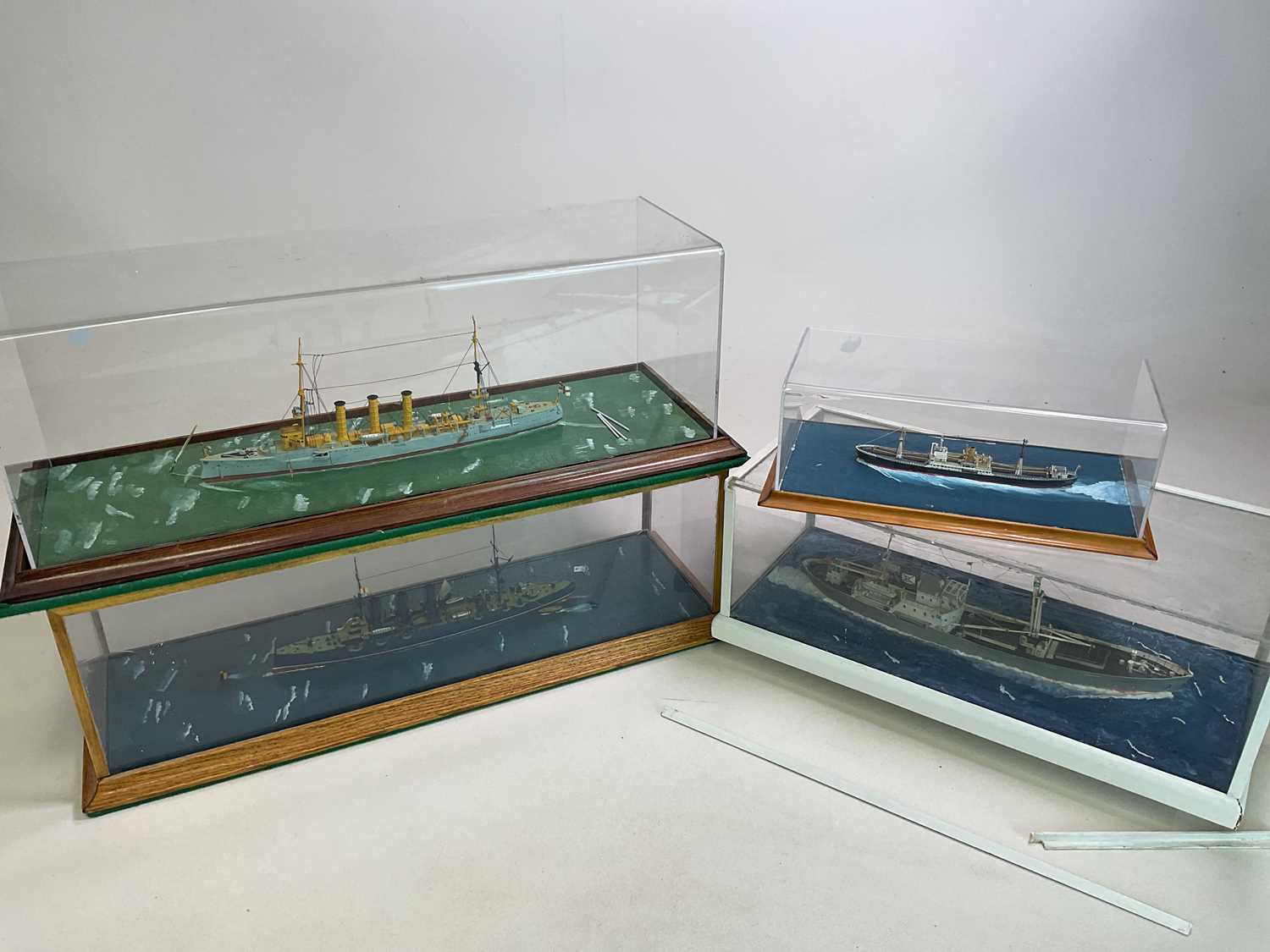 Lot 23 - Four cased ship models to include two