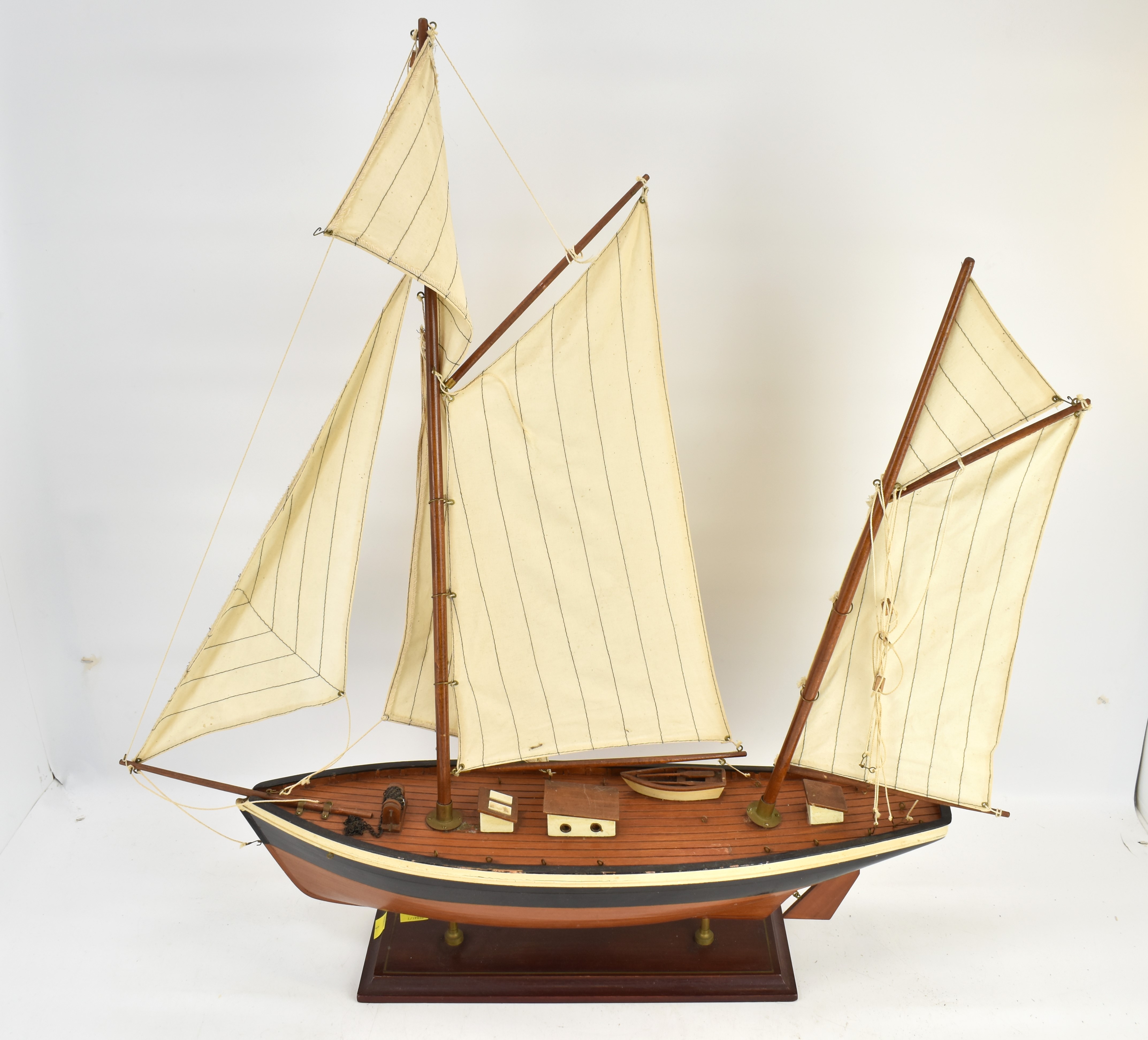 Lot 384 - A wooden model of a two-masted yacht, with