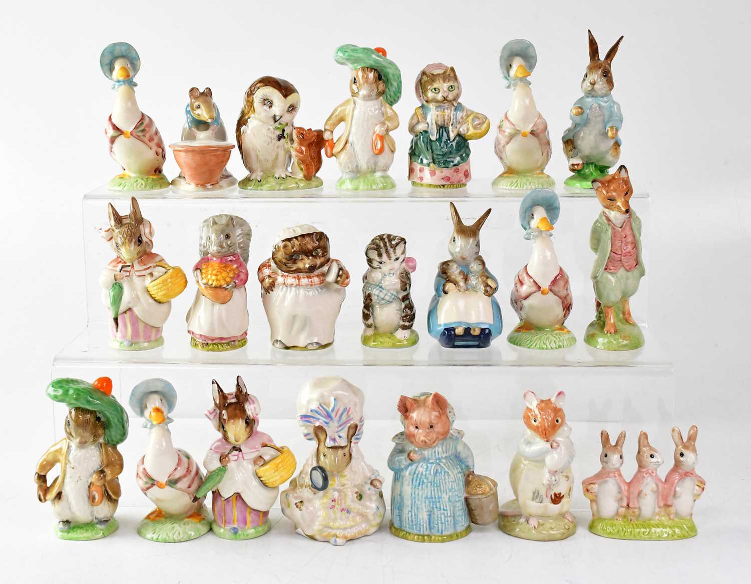 Lot 284 - Twenty-one Beatrix Potter porcelain figures