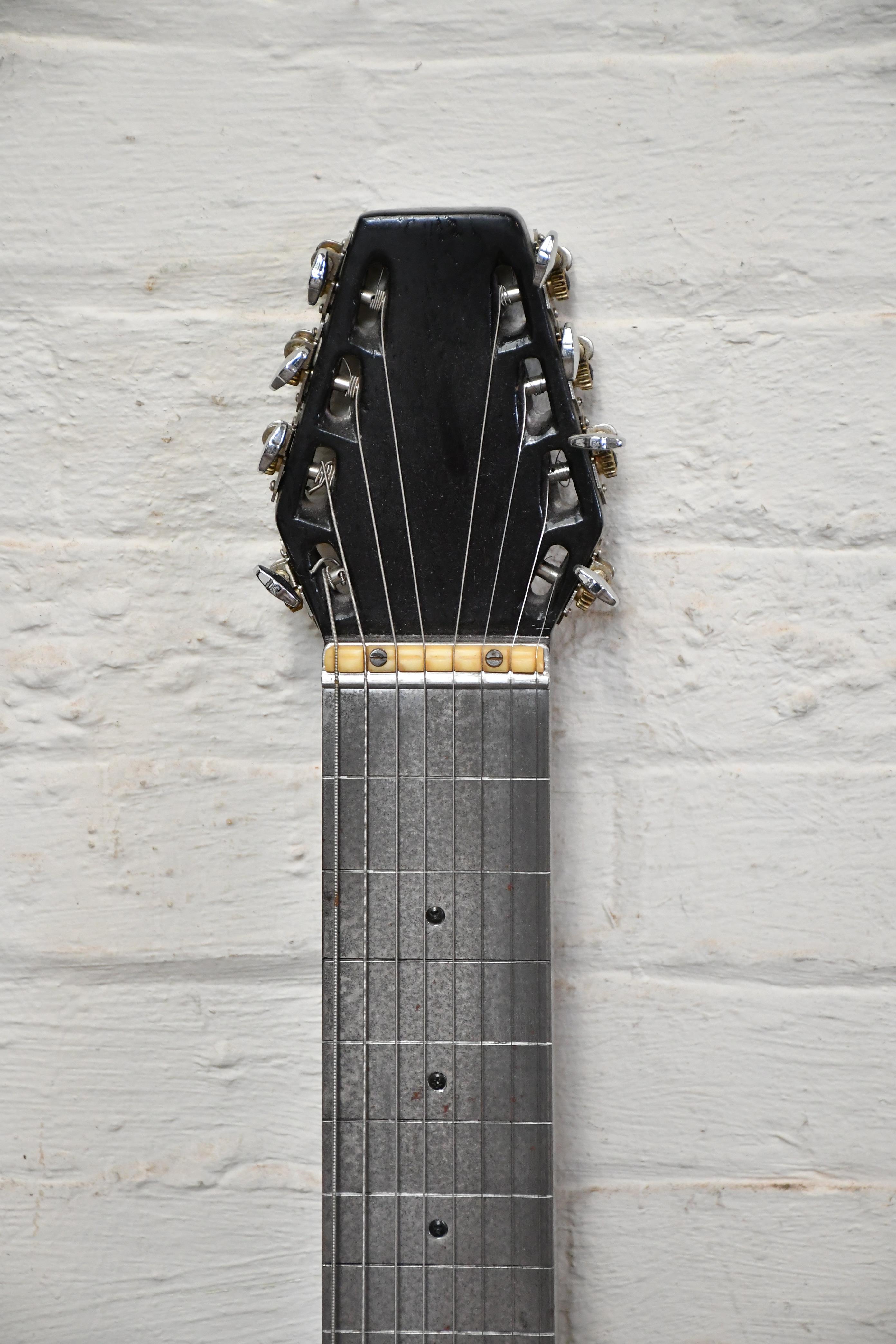 Lot 1521 - A scratch built eight string lap steel